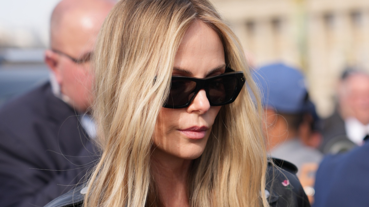 Charlize Theron Walks Past Johnny Depp at Dior Event - Reality Tea