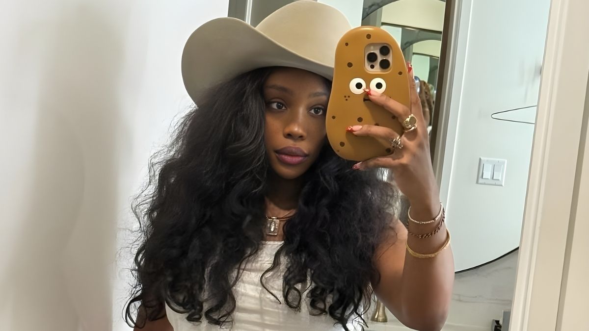 SZA Gets 'Arrested' in Fiery Red Bustier Top in New Video - Reality Tea