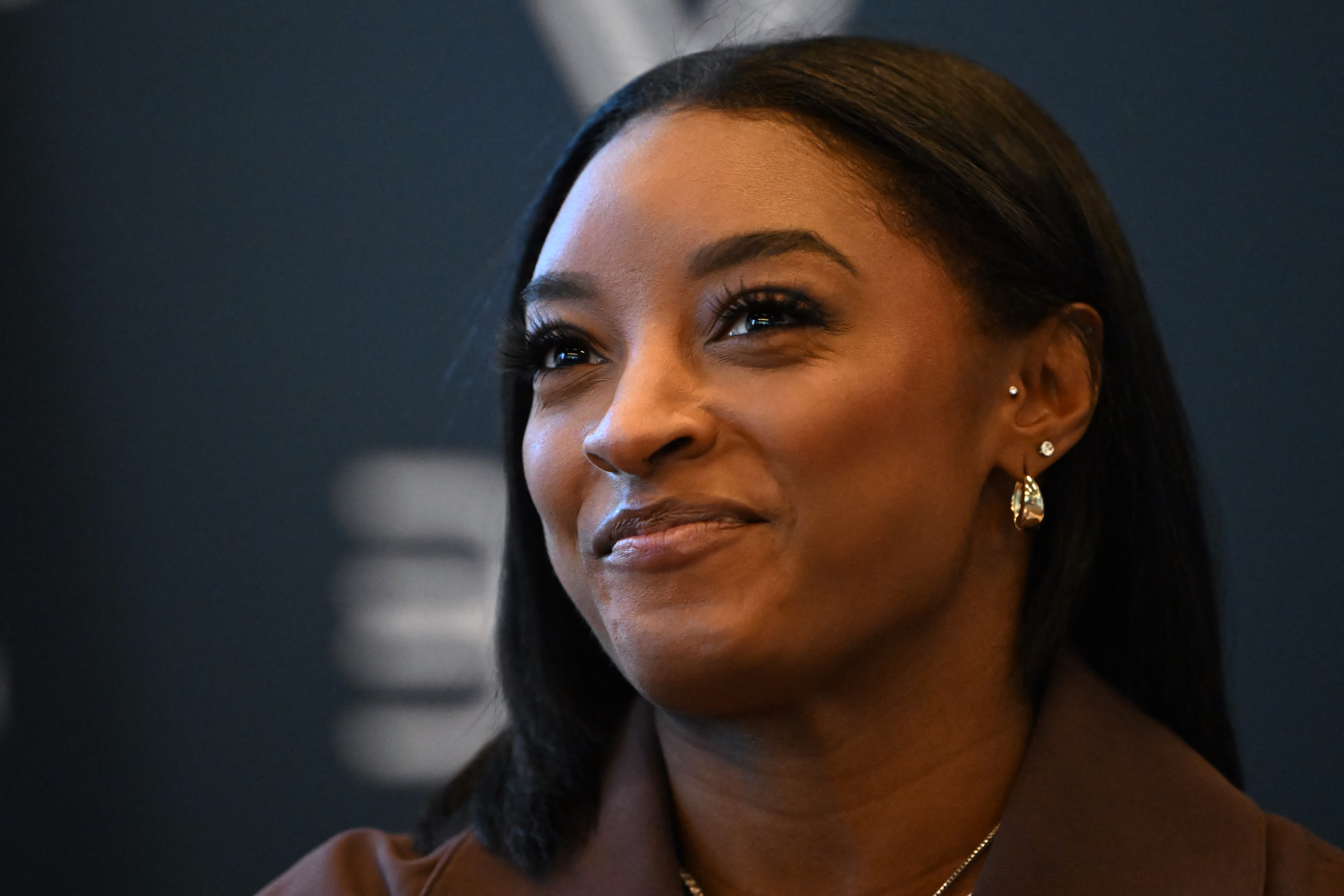 Simone Biles Accused of Having ‘Puppy’s Ears Chopped Off' - Reality Tea