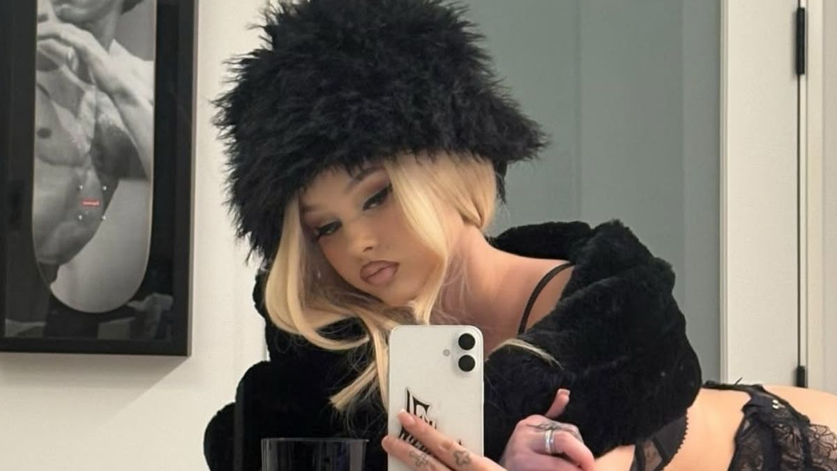 Alabama Barker Adds Lacy Stockings To Daring Leather Dress - Reality Tea
