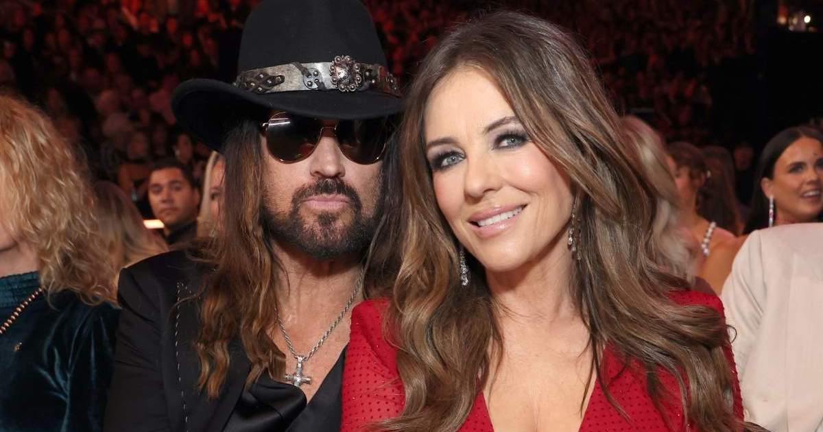 Elizabeth Hurley Celebrates NYE Bond Girl Style With Billy Ray Cyrus ...