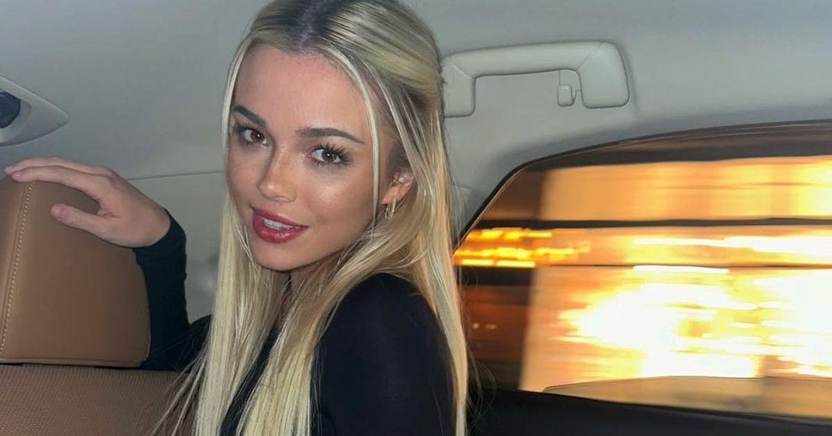 Livvy Dunne’s Unbuttoned Shirt Barely Hangs on in Bikini Photo ...