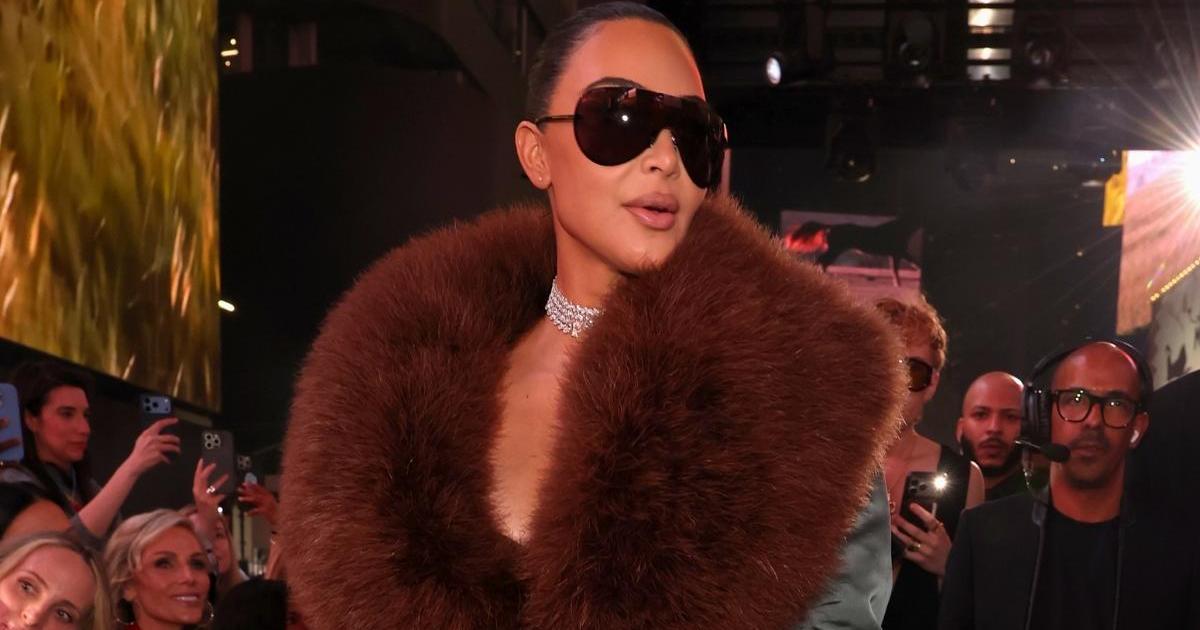 Kim Kardashian's Plunging Top Is Pure Saint Laurent by Tom Ford Heat ...