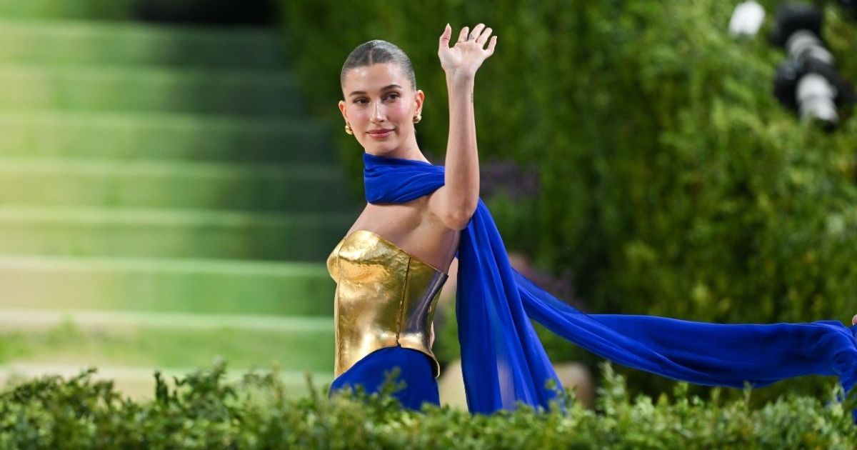 Hailey Bieber's Tiered Alaia Skirt Adds Funky Touch to Bold Plunging ...
