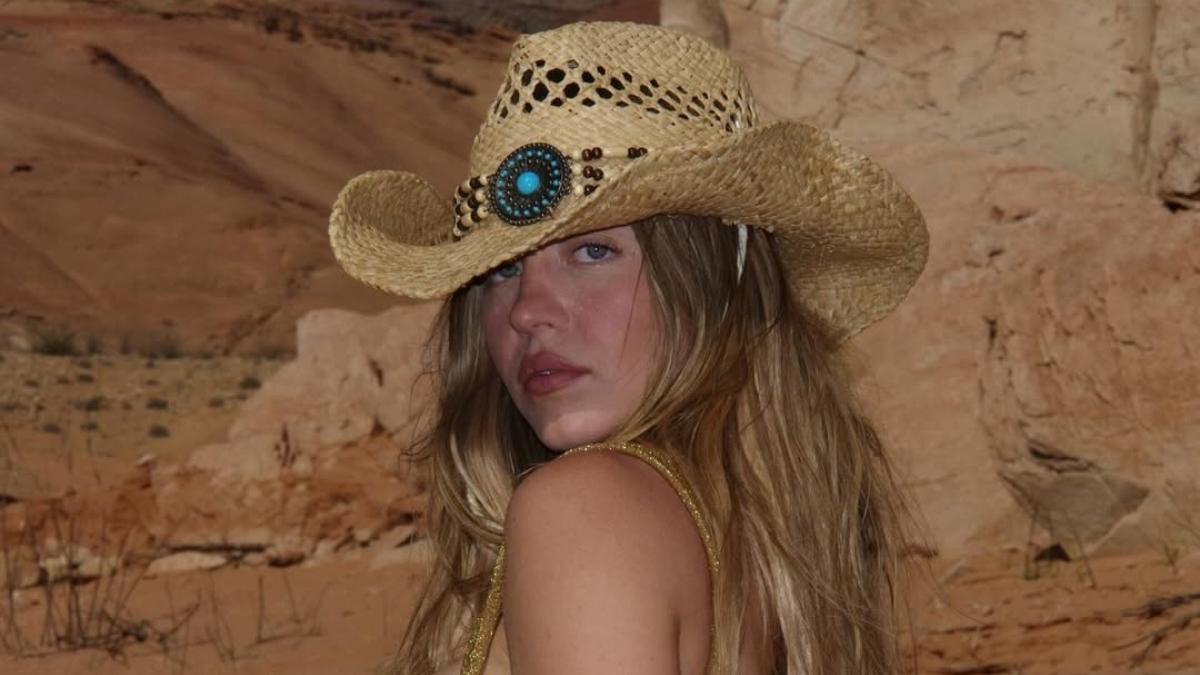 Sydney Sweeney's Syrn Lingerie Peeks Through Plunging Low-Cut Top ...