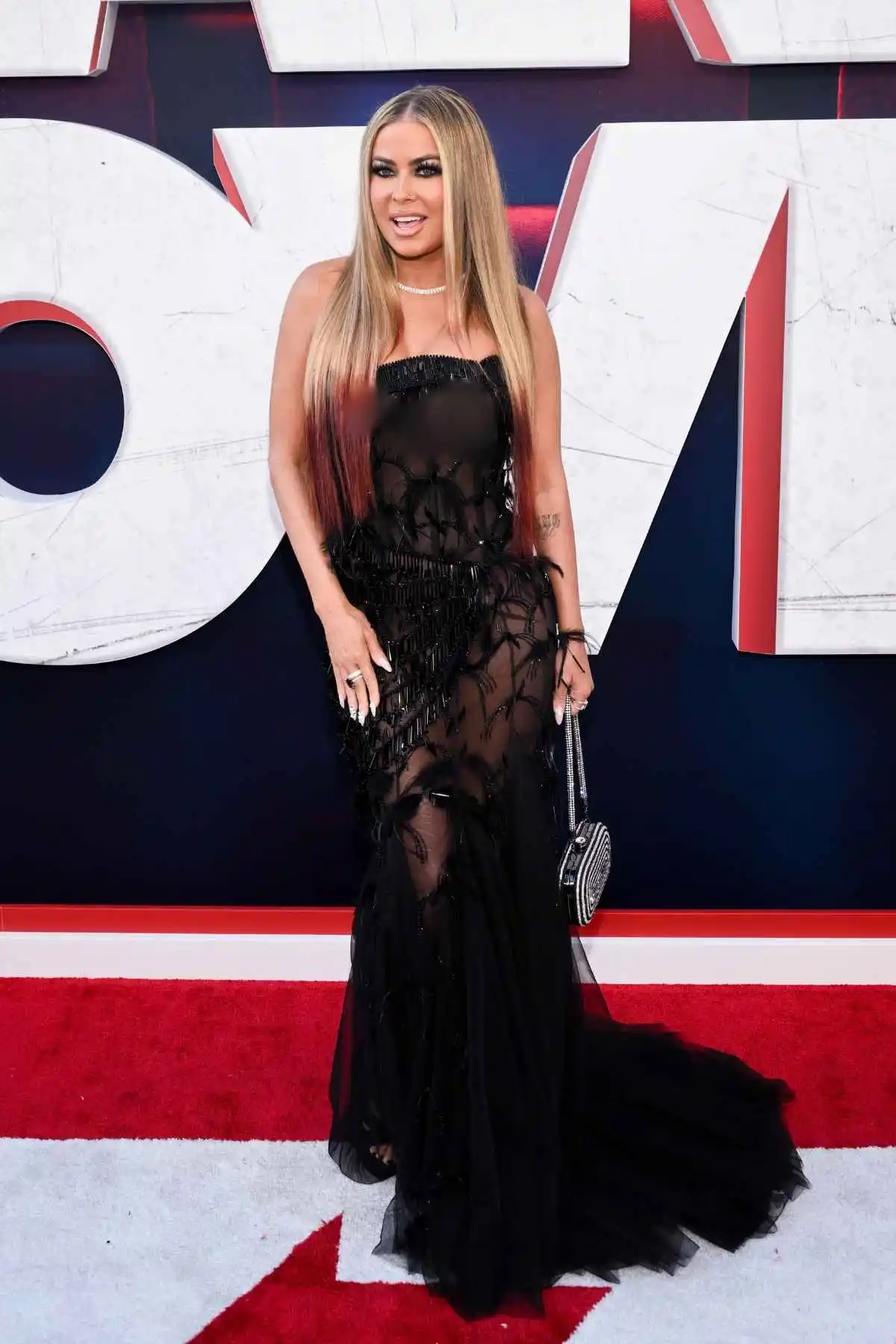 Carmen Electra Walks in a Sheer Dress That Barely Hides Anything ...